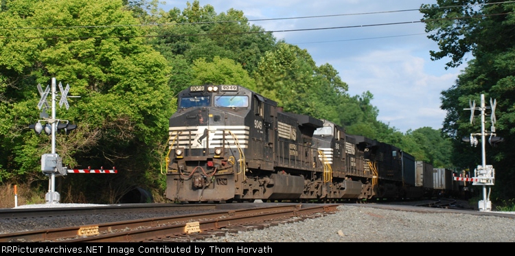 A trio of C40-9Ws brings NS 212 at Lansdown Rd grade crossing